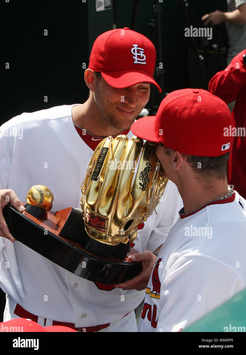 St. Louis Cardinals pitcher Adam Wainwright lets teammate Brendan Ryan ...