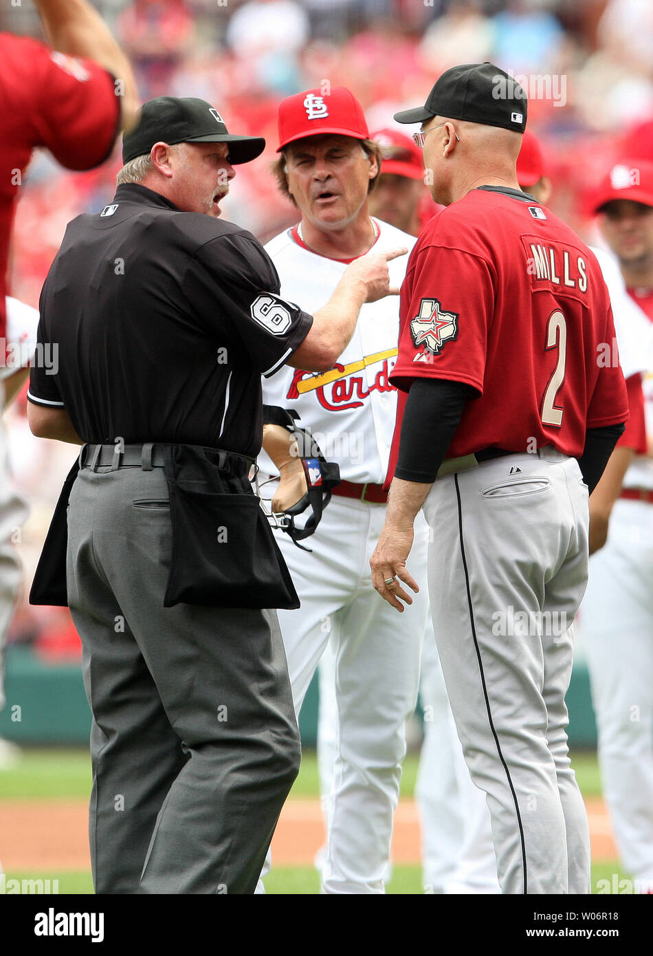 Home plate umpire Jim Joyce issues a warning to St. Louis Cardinals ...