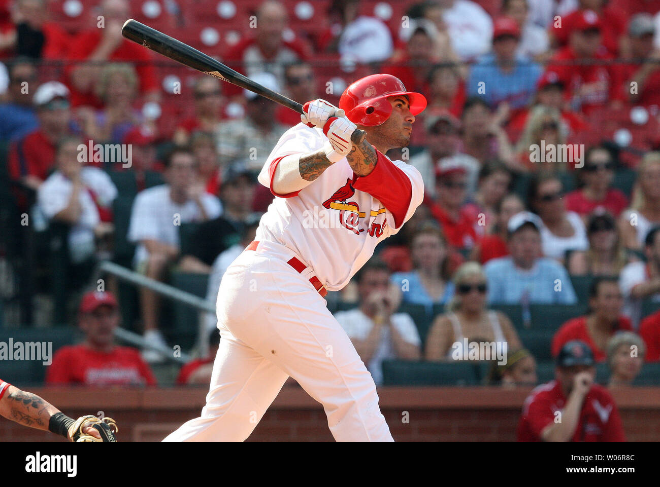 St. Louis Cardinals Felipe Lopez watches his game winning hit with ...