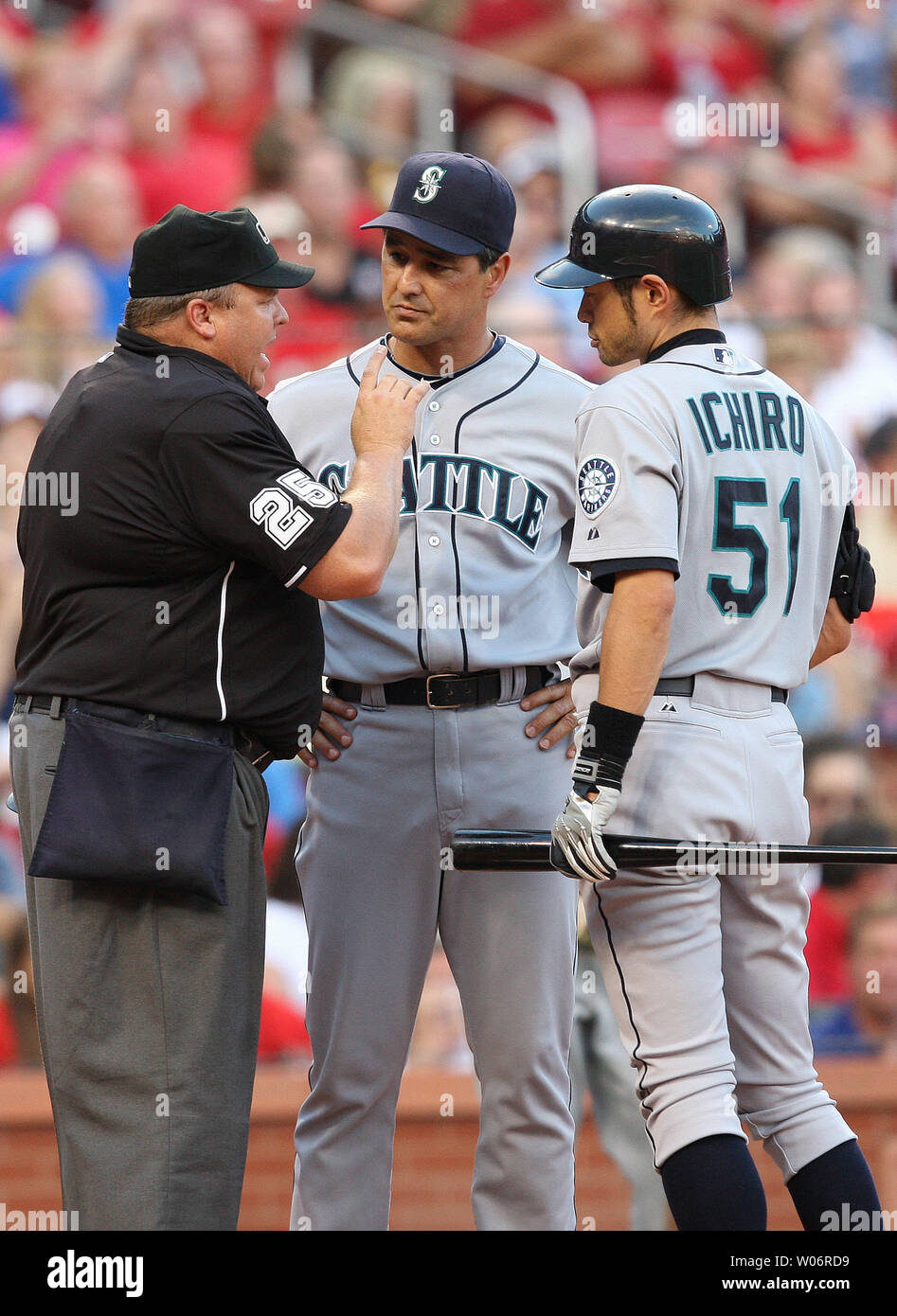 Home plate umpire Fieldin Culbreth (L) explains his call to batter ...