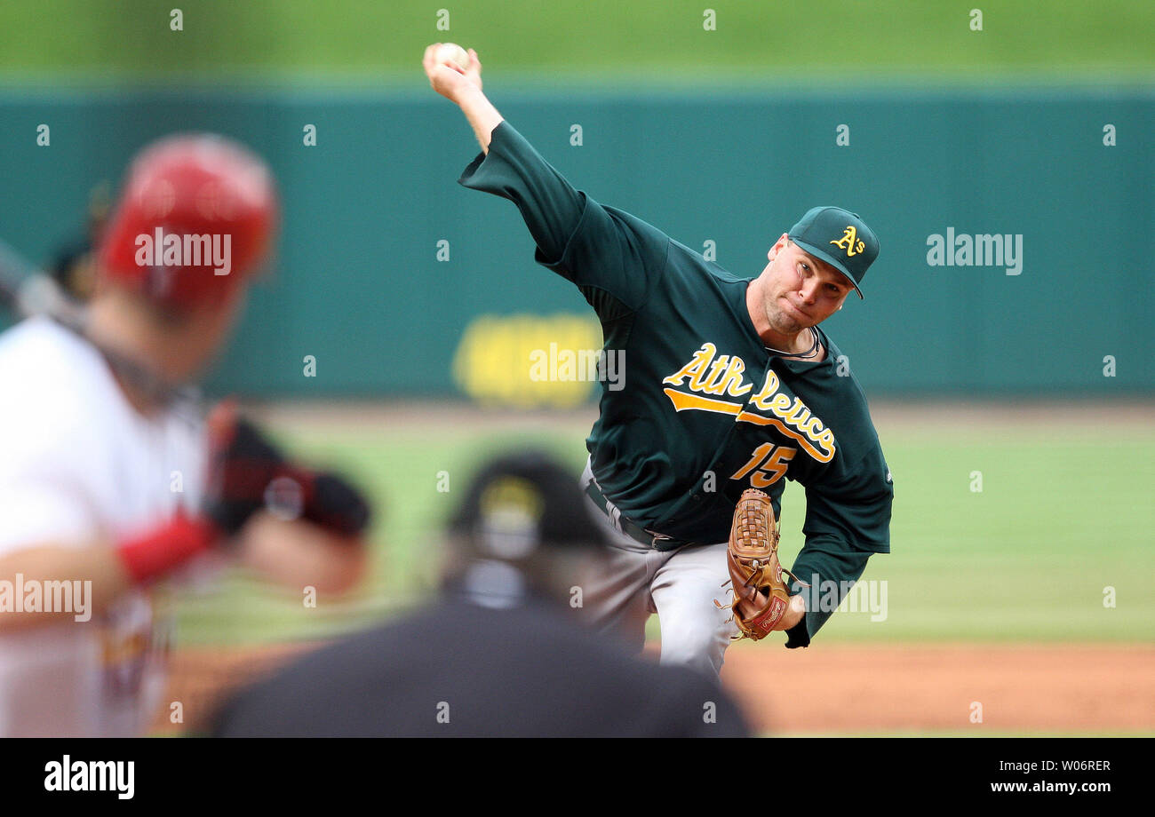 Oakland A's starting pitcher Ben Sheets delivers a pitch to the St ...