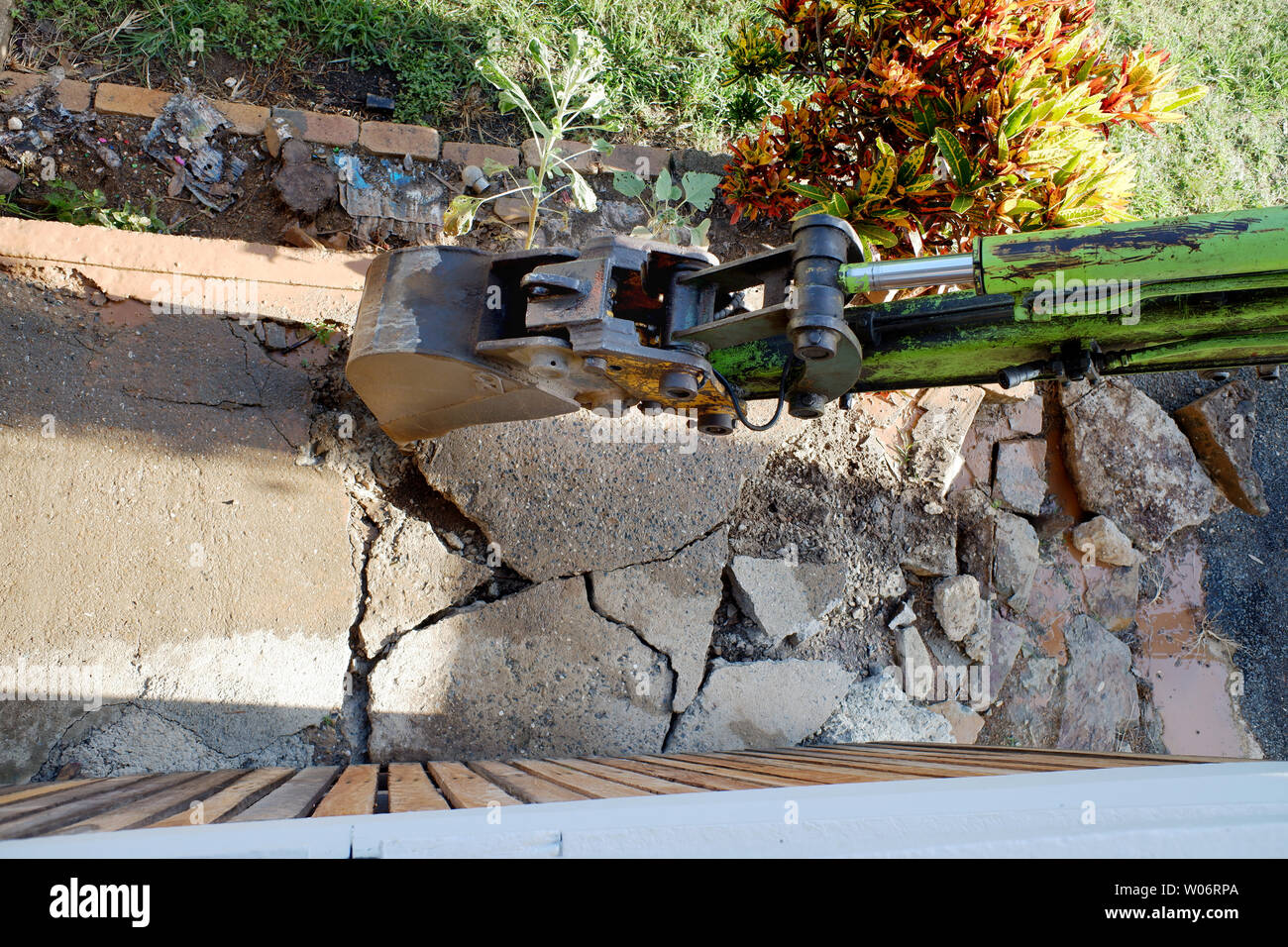 EXCAVATOR BREAKING UP CONCRETE Stock Photo - Alamy