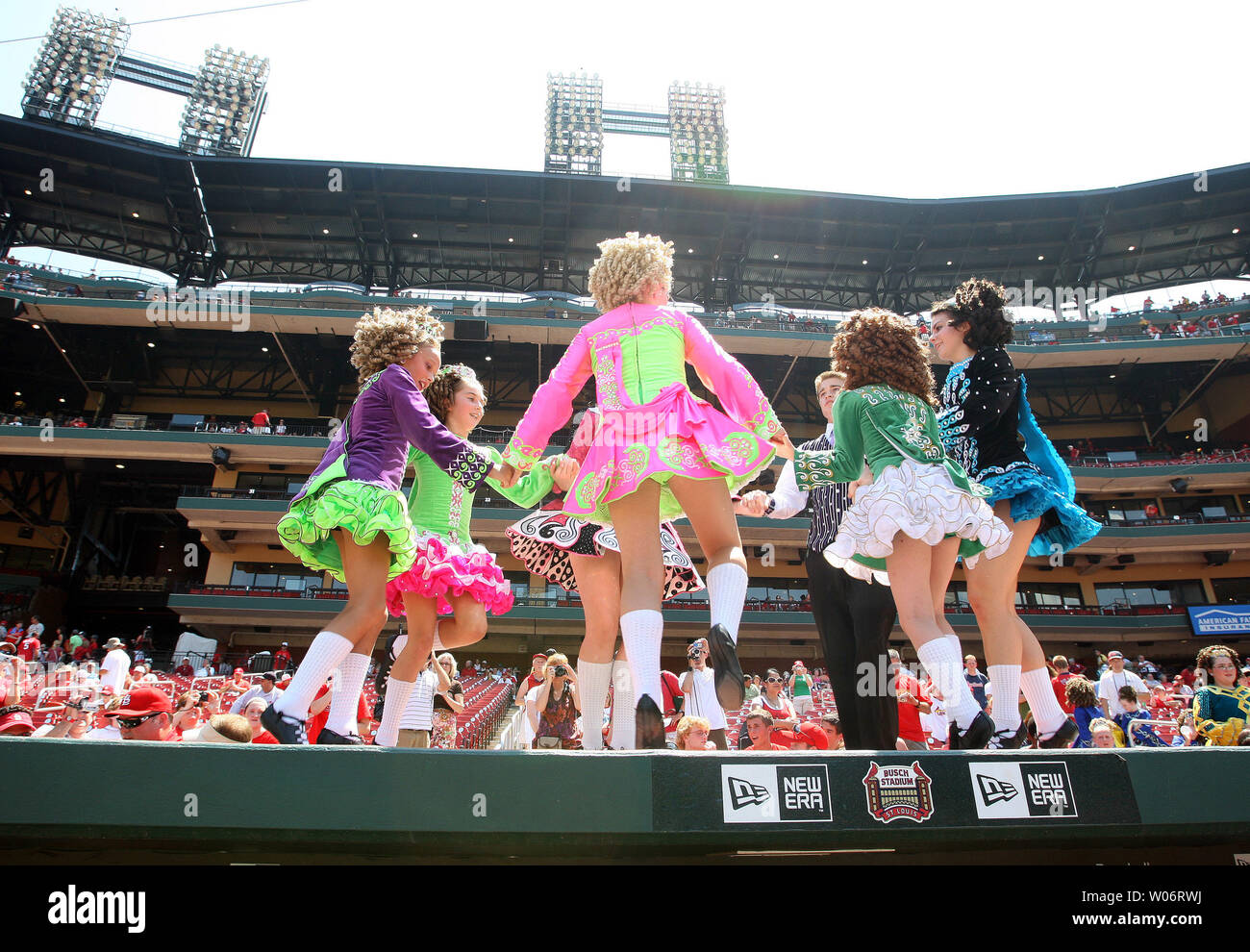 Young dancers perform on top of the dugout during Irish Heritage Day ...