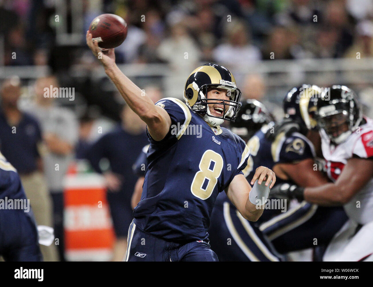 St. Louis Rams quarterback Sam Bradford releases the football in the ...