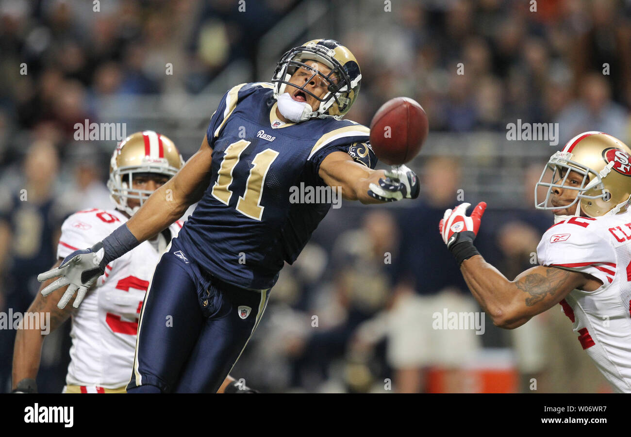 St. Louis Rams Brandon Gibson is just over thrown as san Francisco ...
