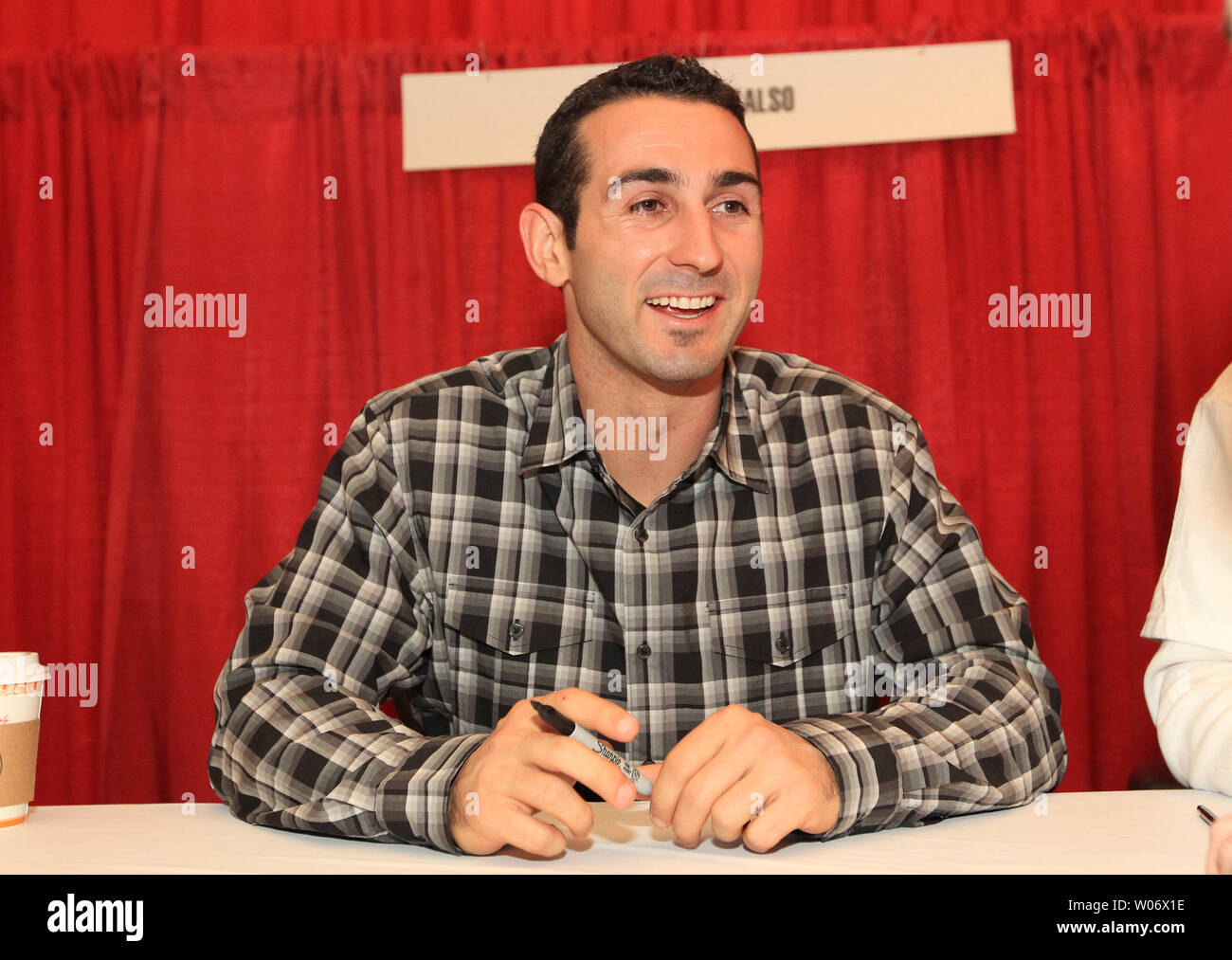 St. Louis Cardinals Daniel Descalso talks with fans during the St ...