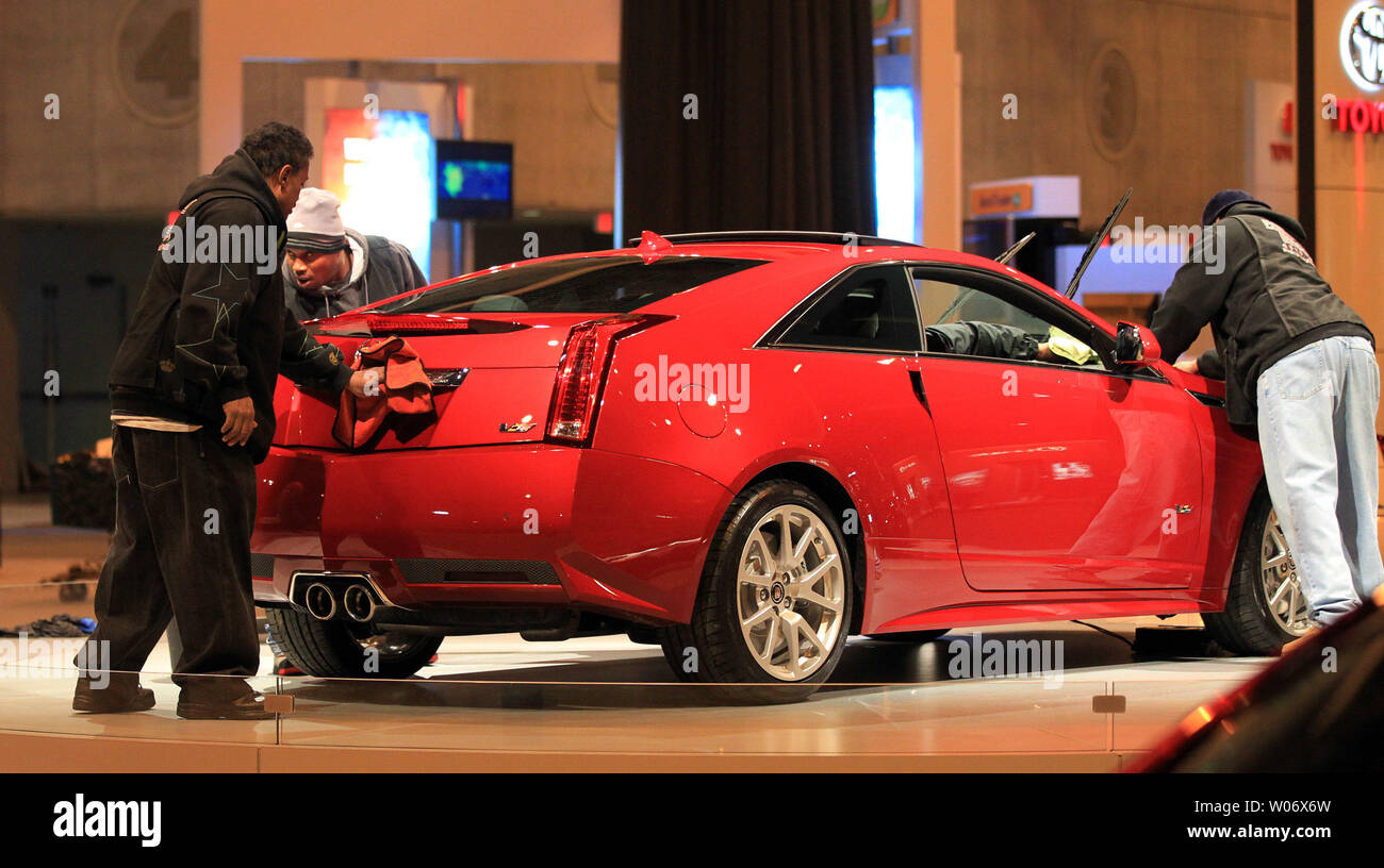 Detailers clean the new 2011 Cadillac CTS-V Coupe as vehicles are ...