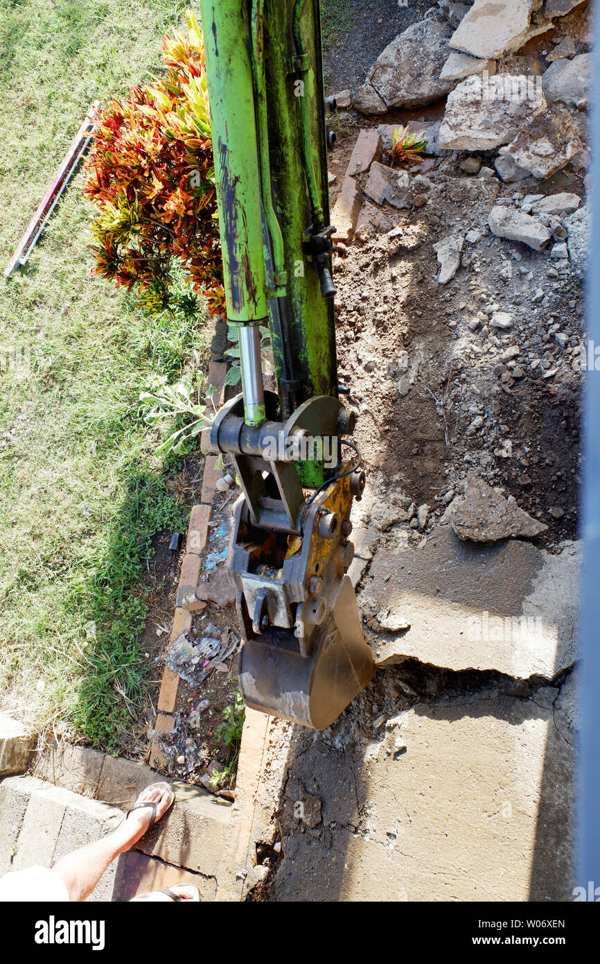 EXCAVATOR BREAKING UP CONCRETE Stock Photo - Alamy