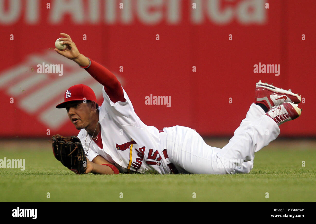 St. Louis Cardinals right fielder Jon Jay shows the baseball after a ...