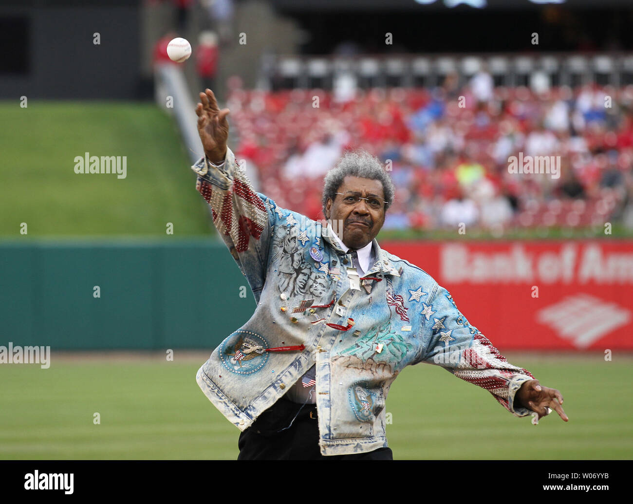 Boxing promoter Don King throws a ceremonial first pitch before the ...
