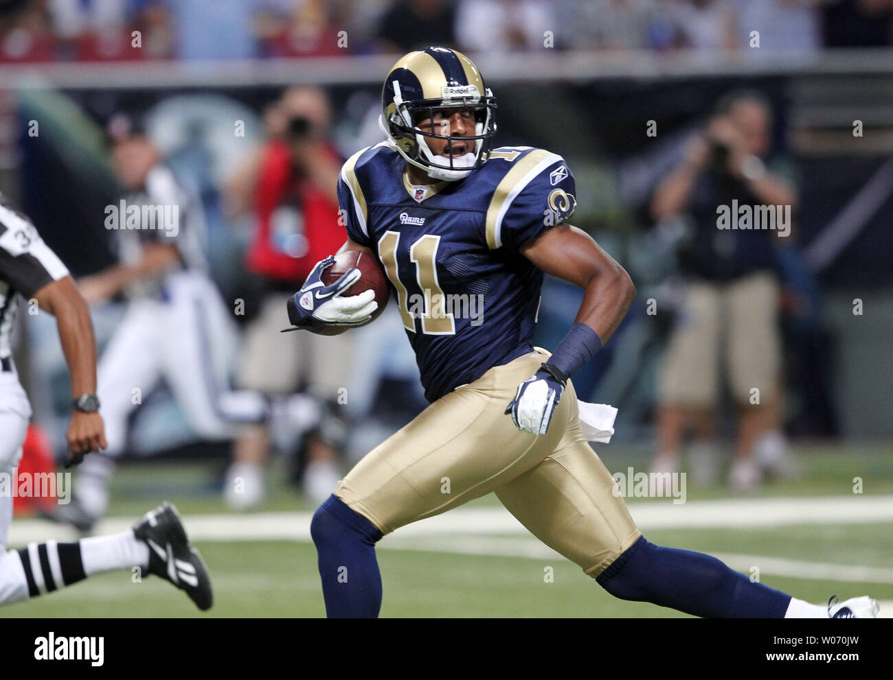 St. Louis Rams Brandon Gibson looks around as he takes the first play ...
