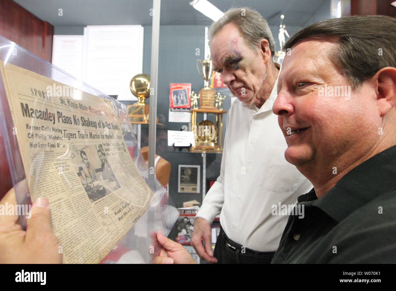 Greg Maracek president of the St. Louis Sports Hall of Fame (R) and ...