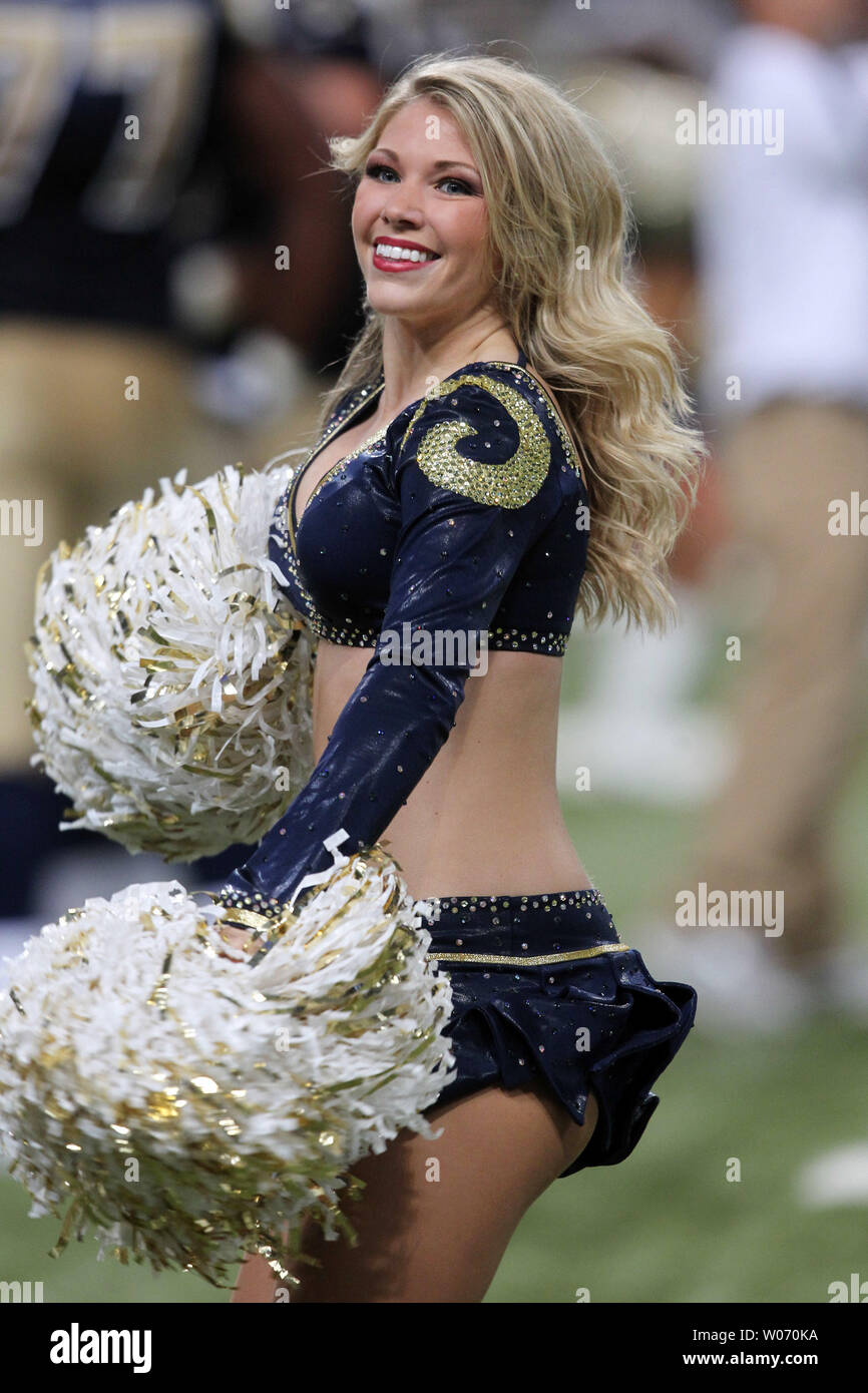 A St. Louis Rams cheerleader entertains the crowd during a time out in ...