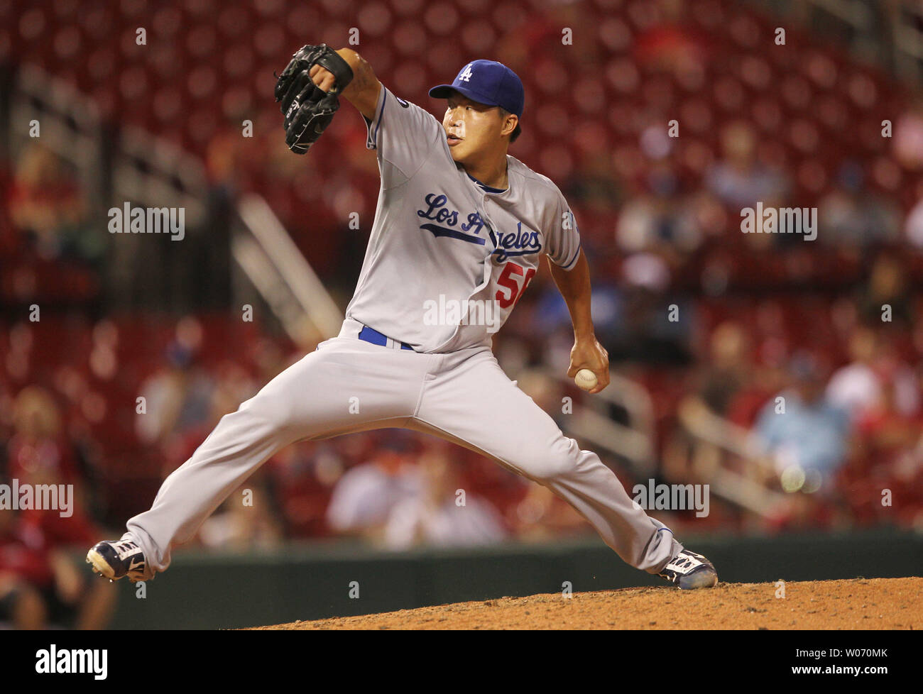 Los Angeles Dodgers pitcher Hong-Chih Kuo delivers a pitch to the St ...
