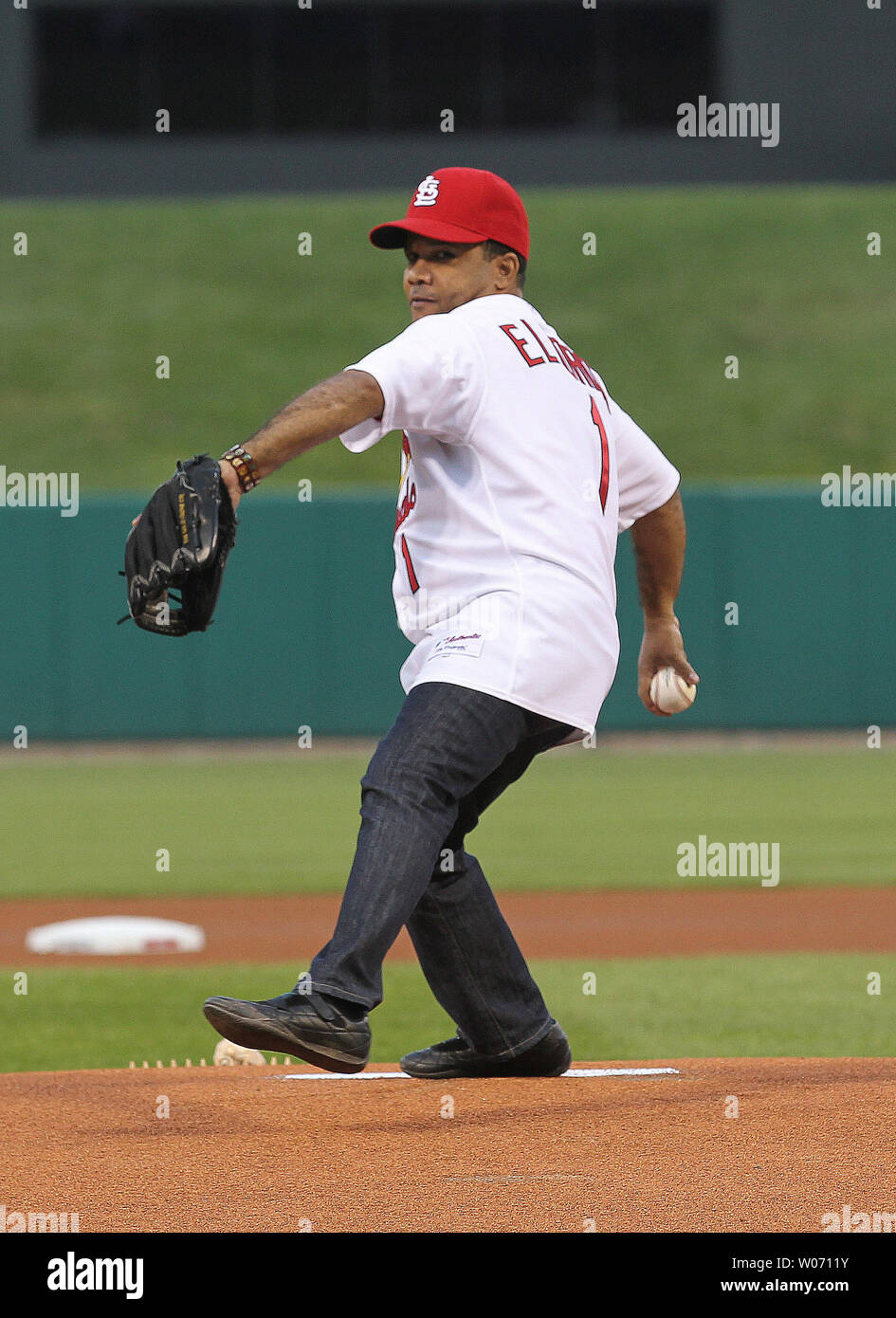 Domician singer Hector Acosta throws a ceremonial first pitch before ...