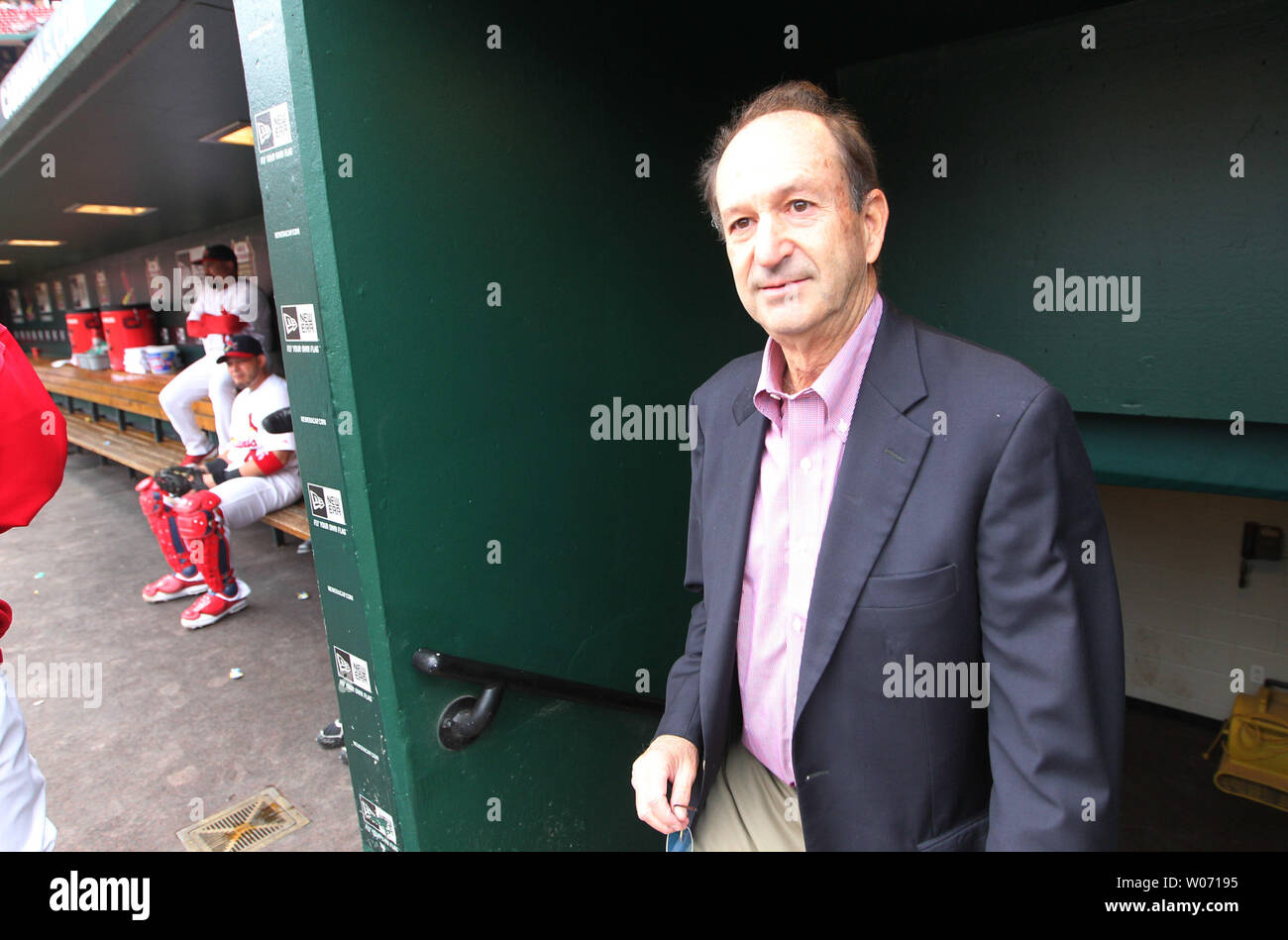 St. Louis Cardinals owner Bill DeWitt Jr. enters the team dugout before ...
