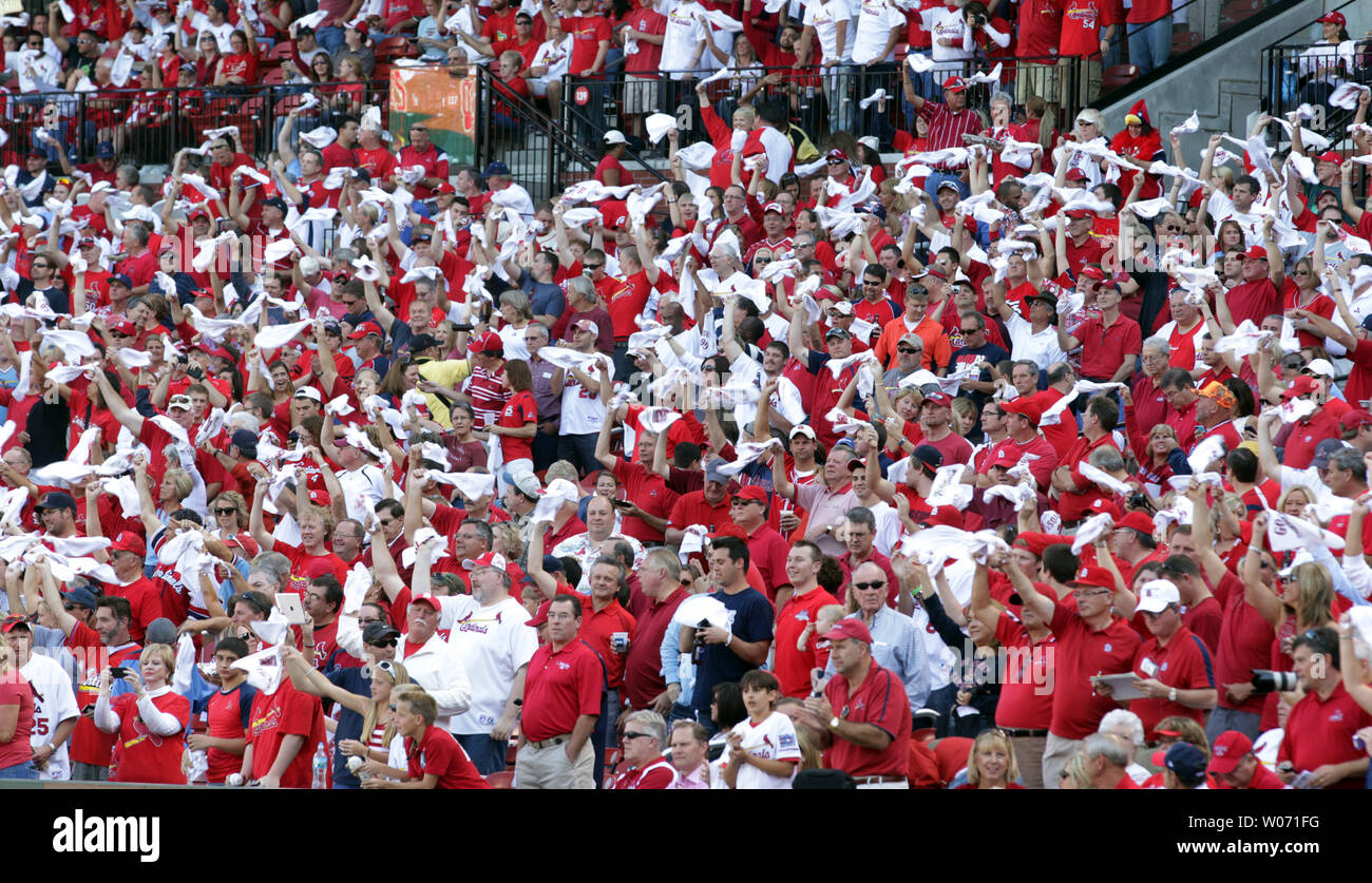 St. Louis Cardinals fans wave white towels before the start of Game 3 ...