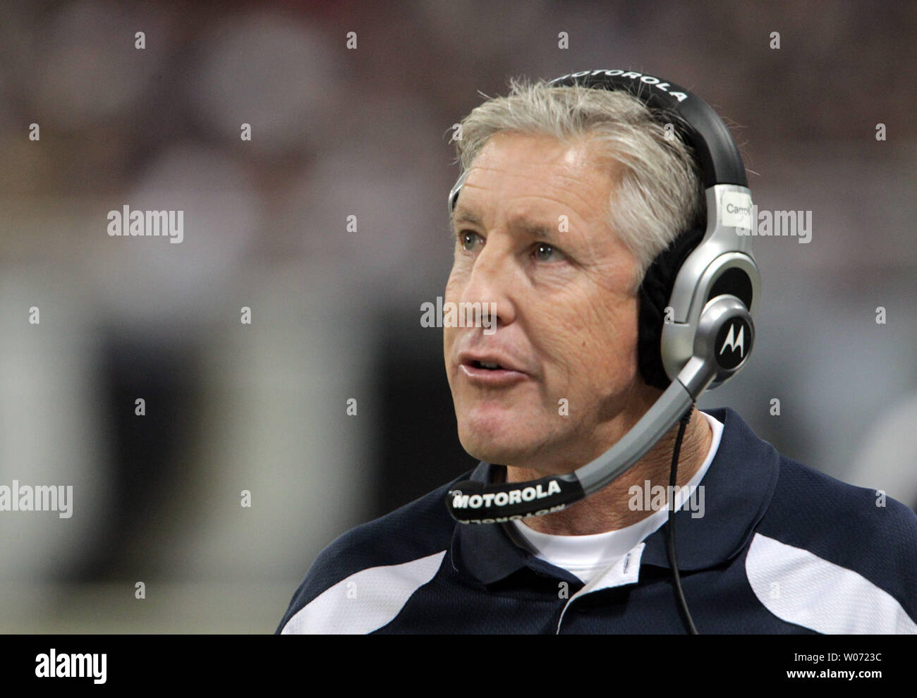 Seattle Seahawkshead football coach Pete Carroll watches a video replay ...