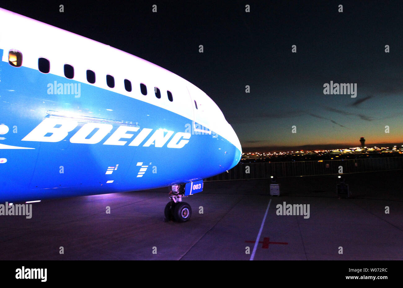 A Boeing 787 Dreamliner sits on the tarmac at Lambert -St. Louis ...