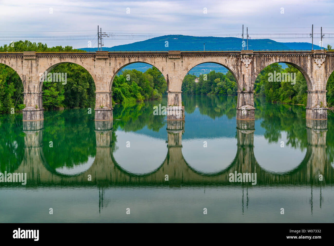 Old stone bridge reflection in the water. Architecture symmetry Stock ...