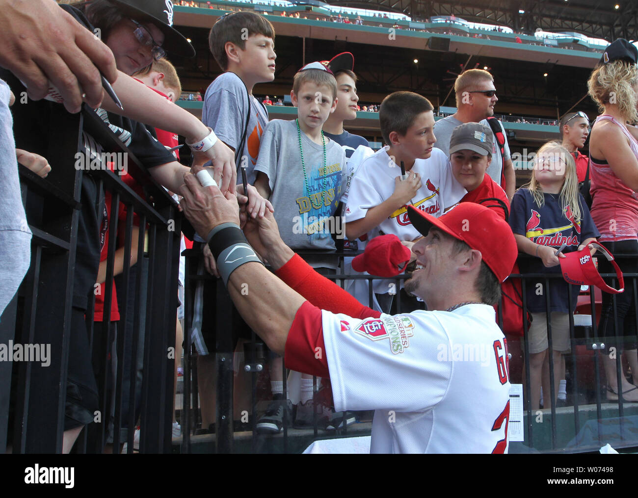 St. Louis Cardinals Tyler Greene signs autographs before a game against ...