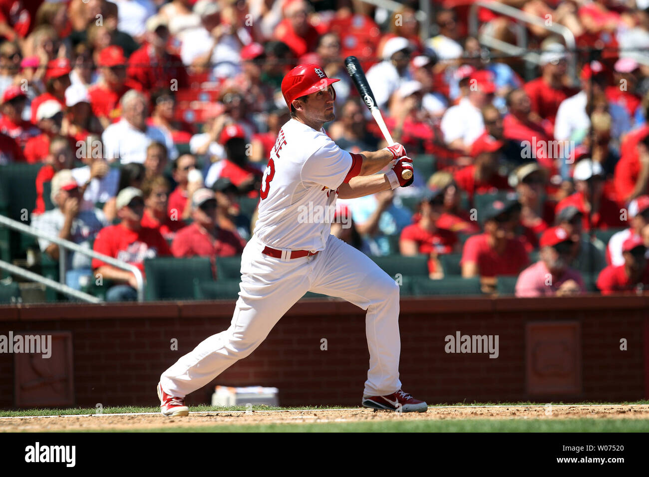 St. Louis Cardinals David Freese watches his three run home run leave ...