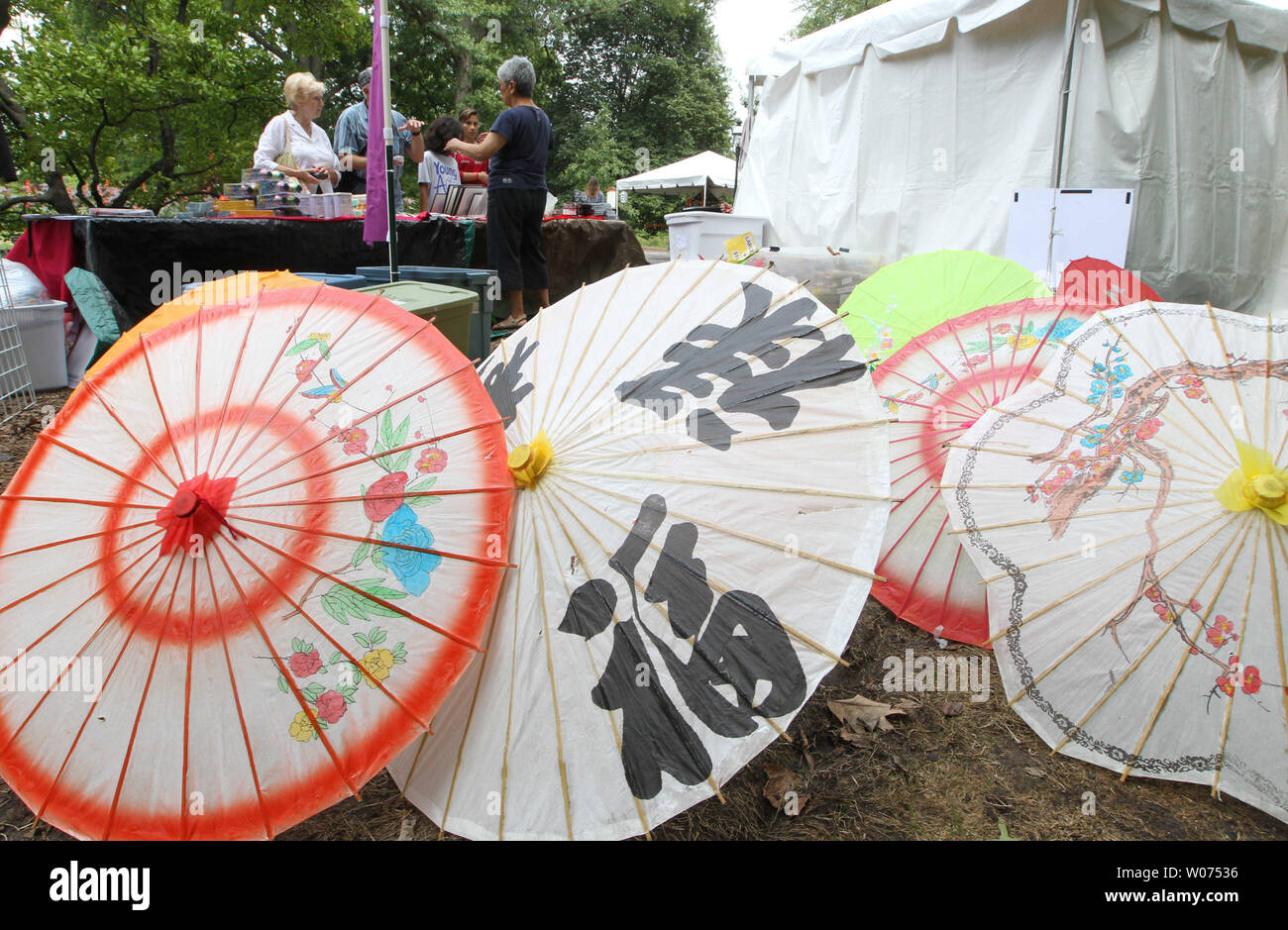 Large paper parisol umbrella's are on display for sale during the ...