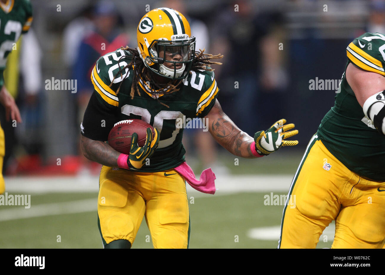 Green Bay Packers Alex Green runs the football in the fourth quarter ...