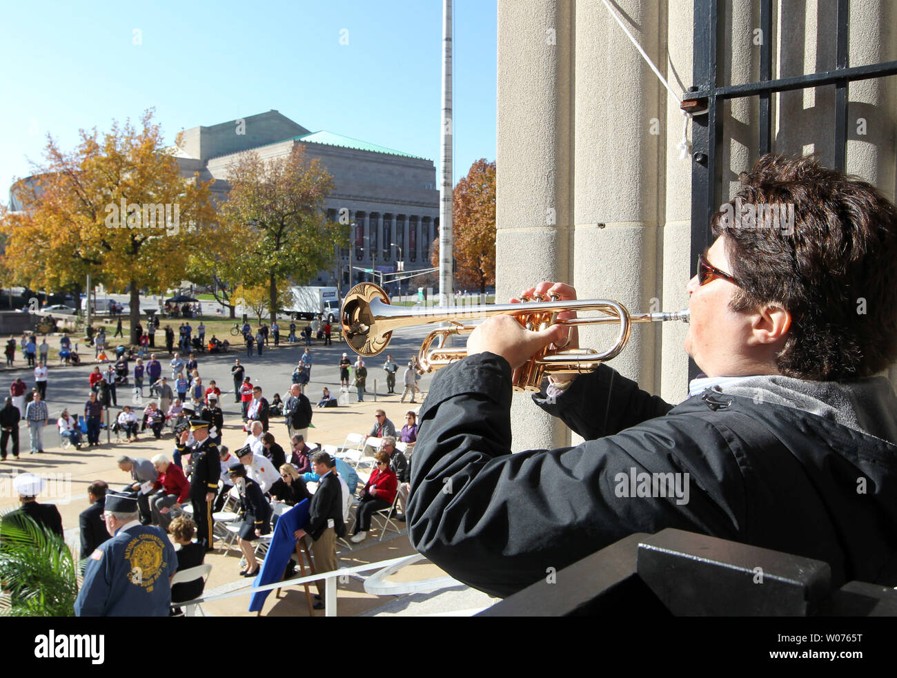 A trumpeter plays taps during Veterans Day ceremonies at Soilders ...