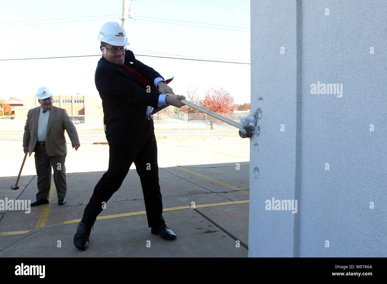 St. Ann, Missouri mayor Michael G. Corcoran, takes a swing at the old ...