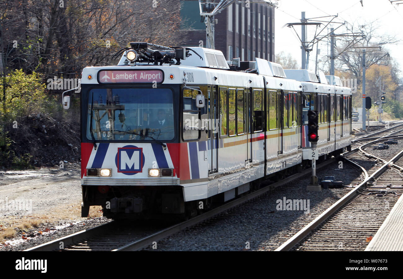 A Metro train approaches a Metro Transit station in Wellston, Missouri ...
