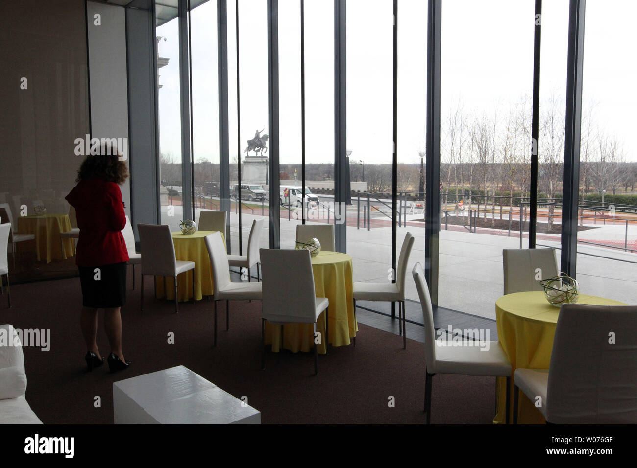 A visitor to the new East Building Art Museum checks the view from the ...