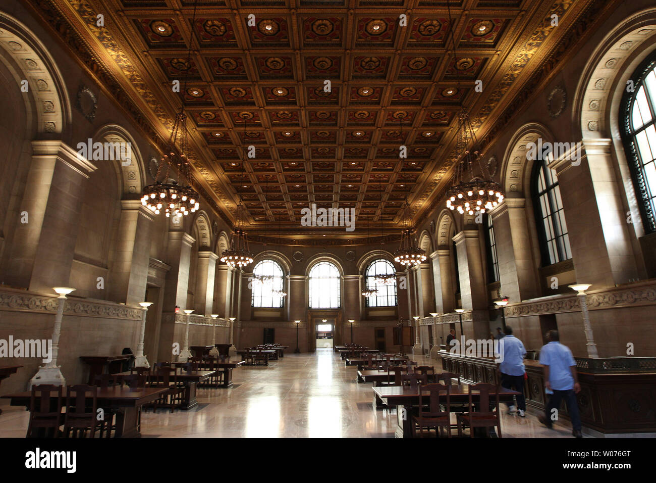 Workers check the Grand Hall of the main branch of the St. Louis ...