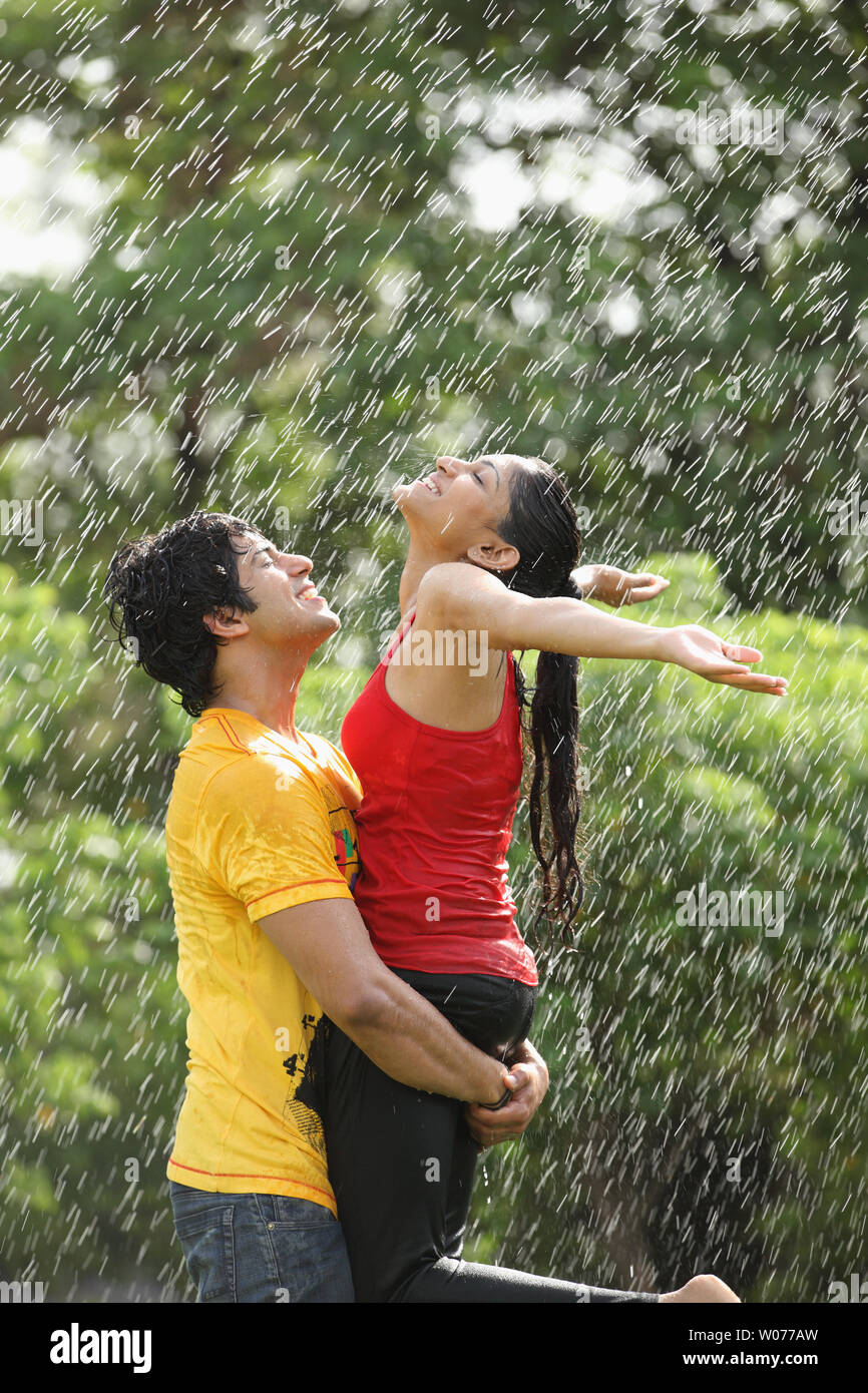 Indian couple romancing in park hi-res stock photography and images - Alamy