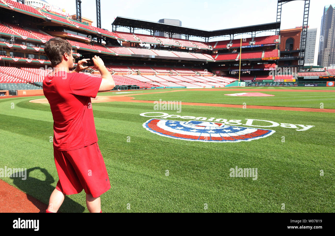 St Louis Cardinals David Freese Uses His Cell Phone To Photograph The