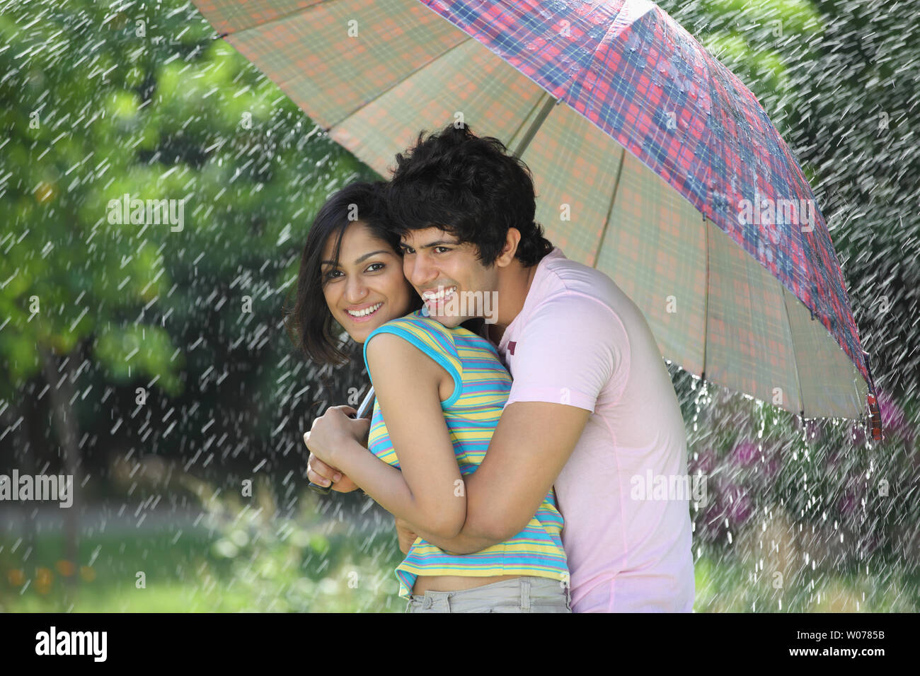 Indian couple romancing in park hi-res stock photography and images - Alamy