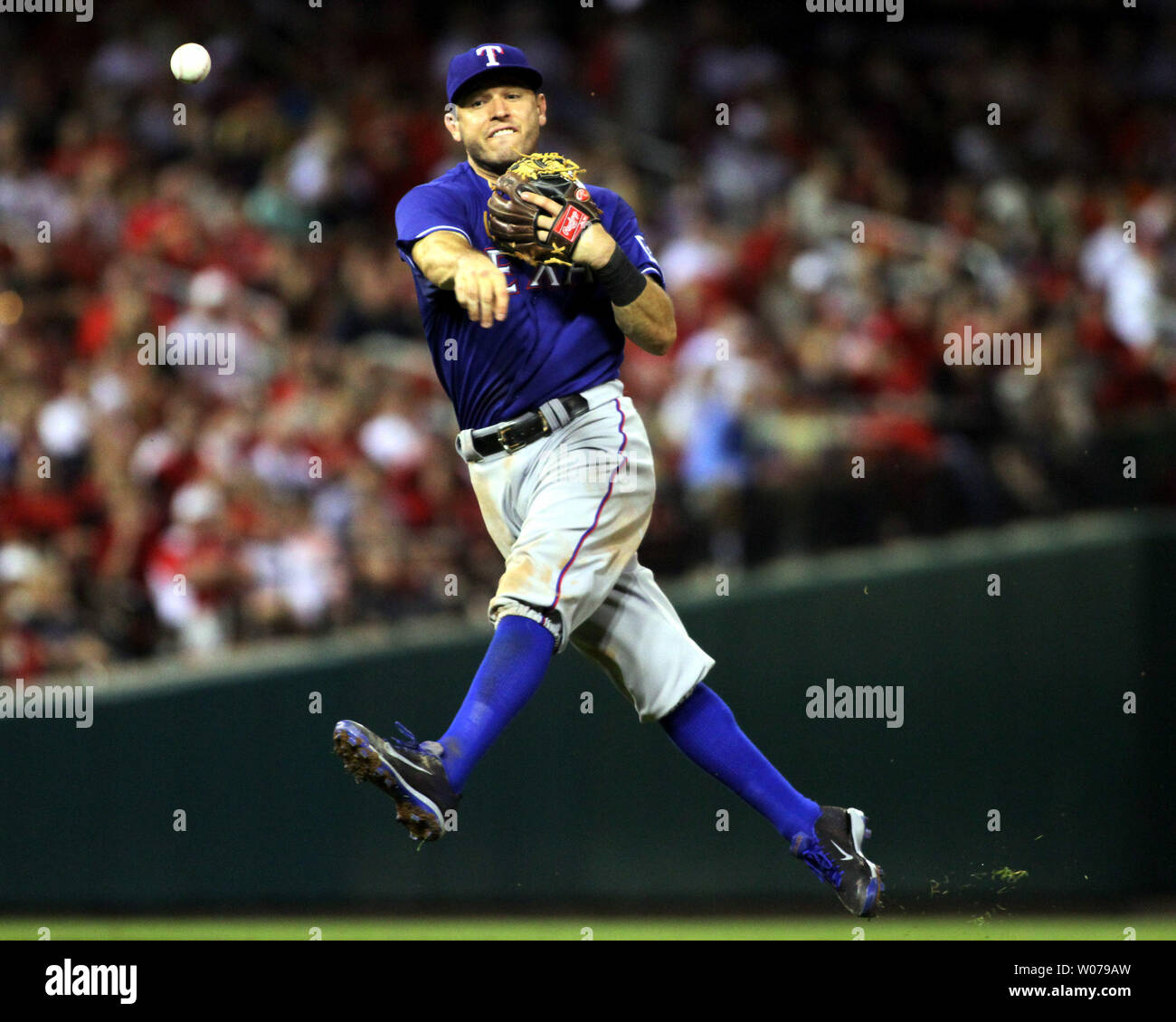 Texas Rangers Elvis Andrus throws on St.Louis Cardinal Matt Holliday in ...