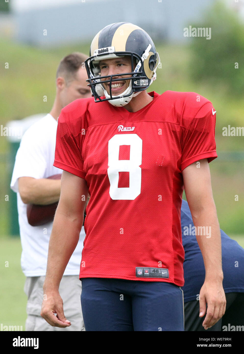 St. Louis Rams quarterback Sam Bradford smiles as he watches practice ...