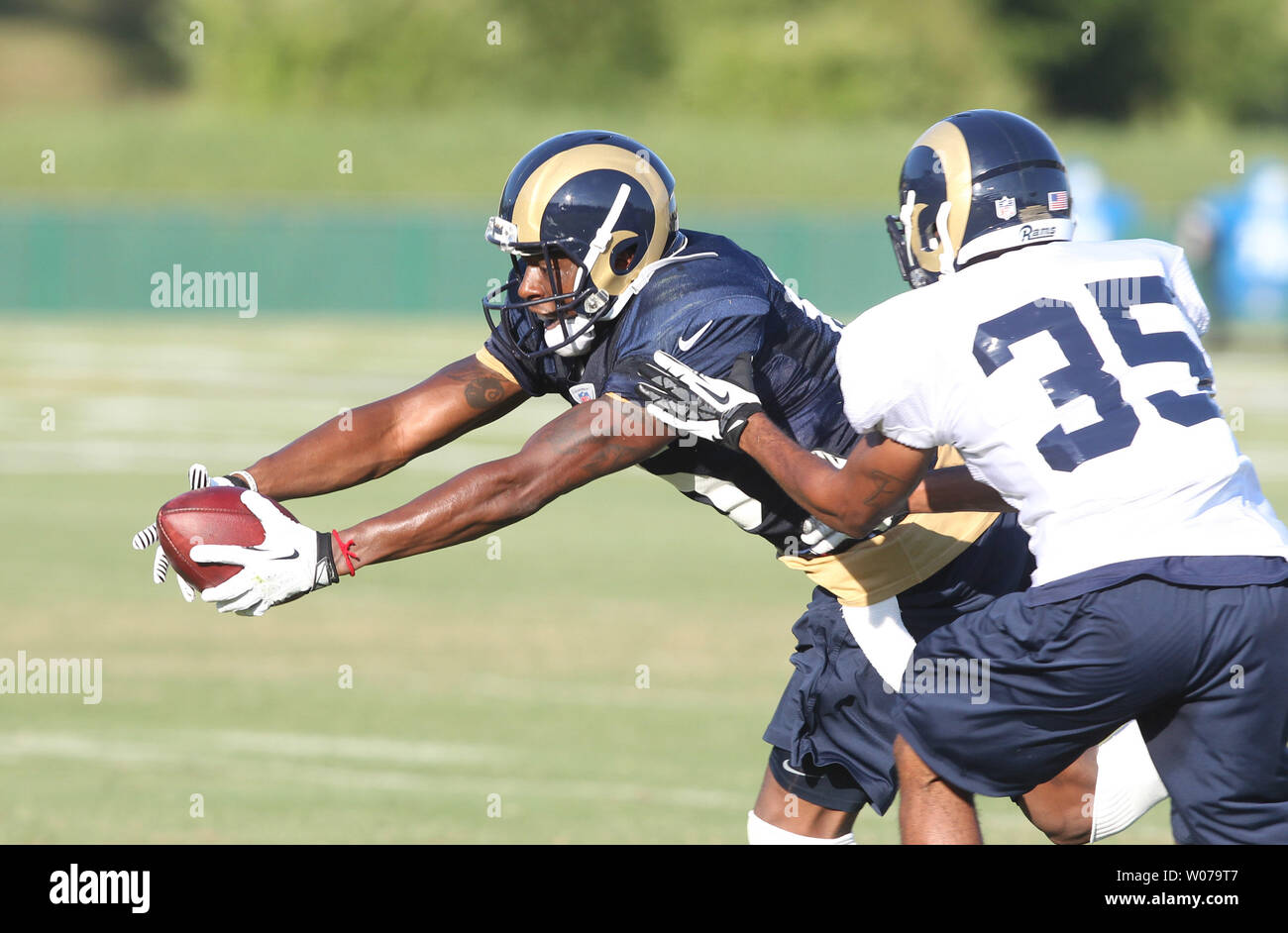 St. Louis Rams Raymond Radway (L) reaches for goal line in front of ...