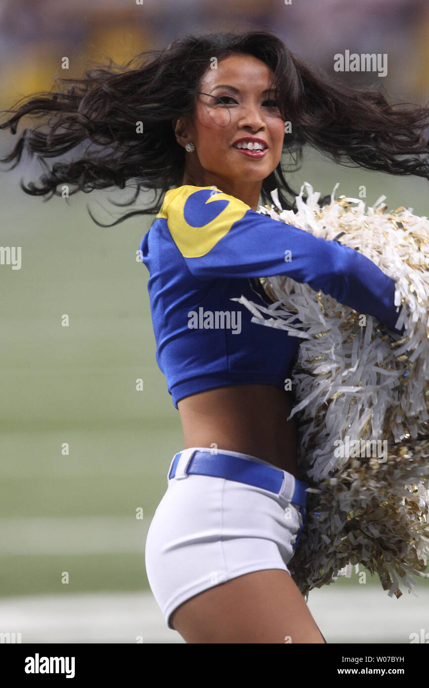 A St. Louis Rams cheerleader entertains the crowd during the fourth ...