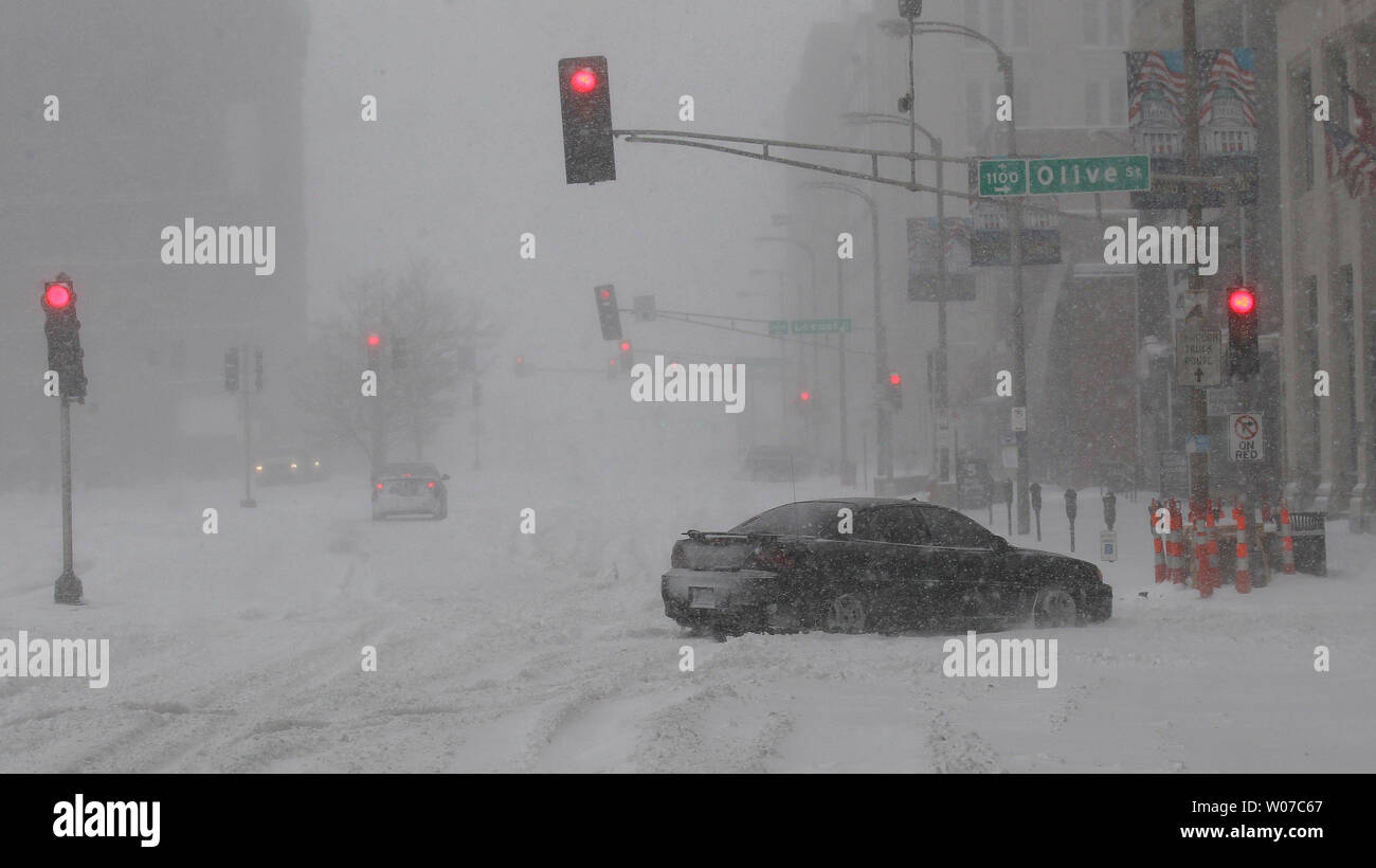 A car is left abandoned on normally busy Tucker Blvd during a blinding ...