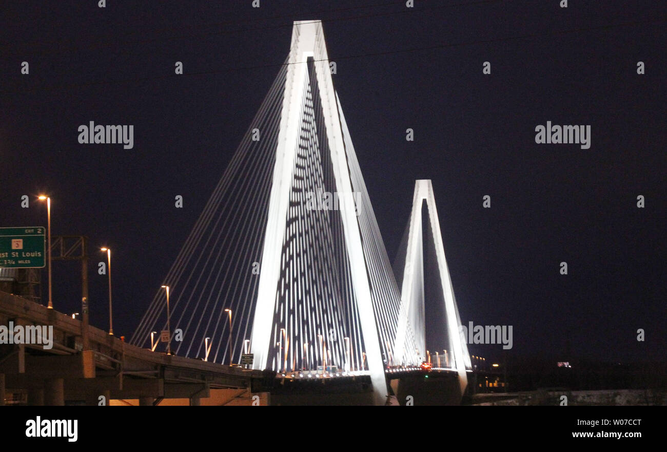The Stan Musial Veterans Memorial Bridge is lit for the first time as ...