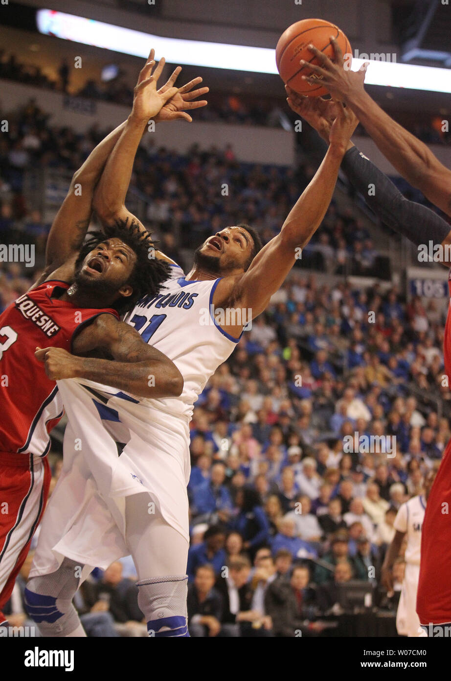Saint Louis University Billikens Dwayne Evans (21) battles theDuquesne ...