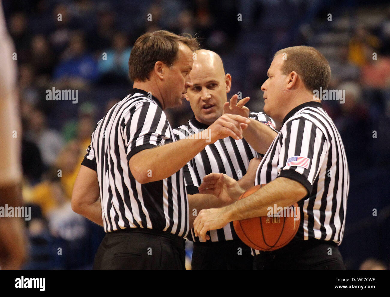 Game officials (L to R) John Higgins, Kipp Kissinger and Gerry Pollard ...