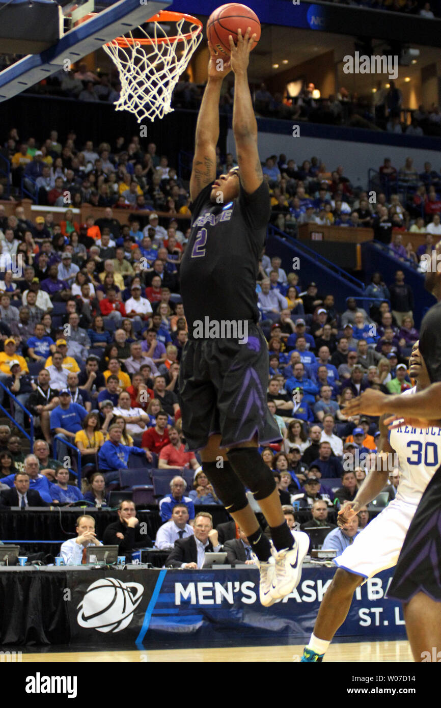Kansas State Wildcats Marcus Foster (2) dunks against the Kentucky ...