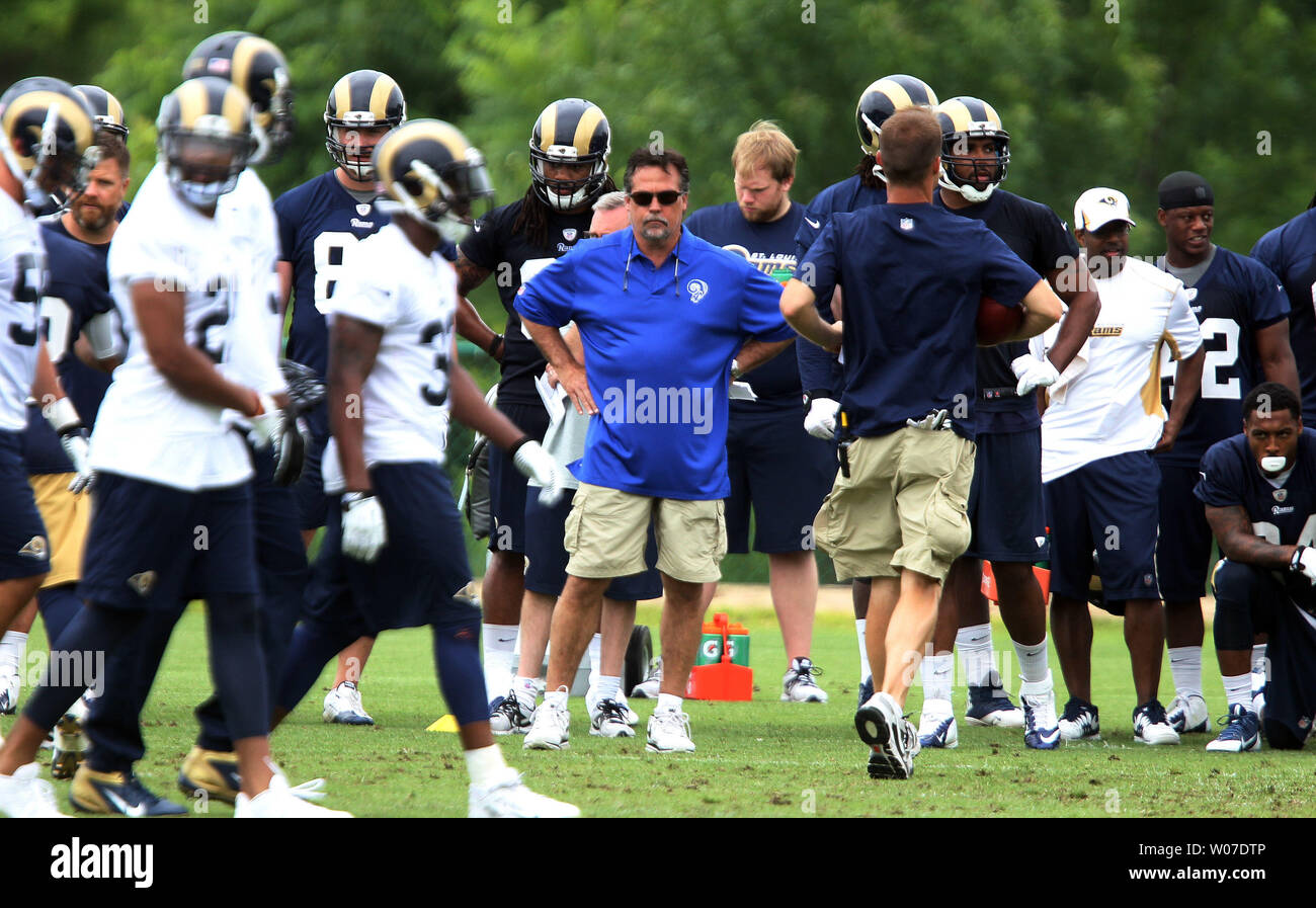 St. Louis Rams head football coach Jeff Fisher watches his players ...