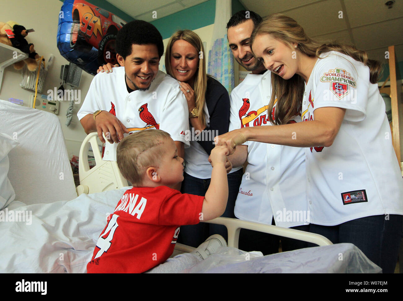 St. Louis Cardinals players and their wives Jon and Nikki Jay (L) and ...