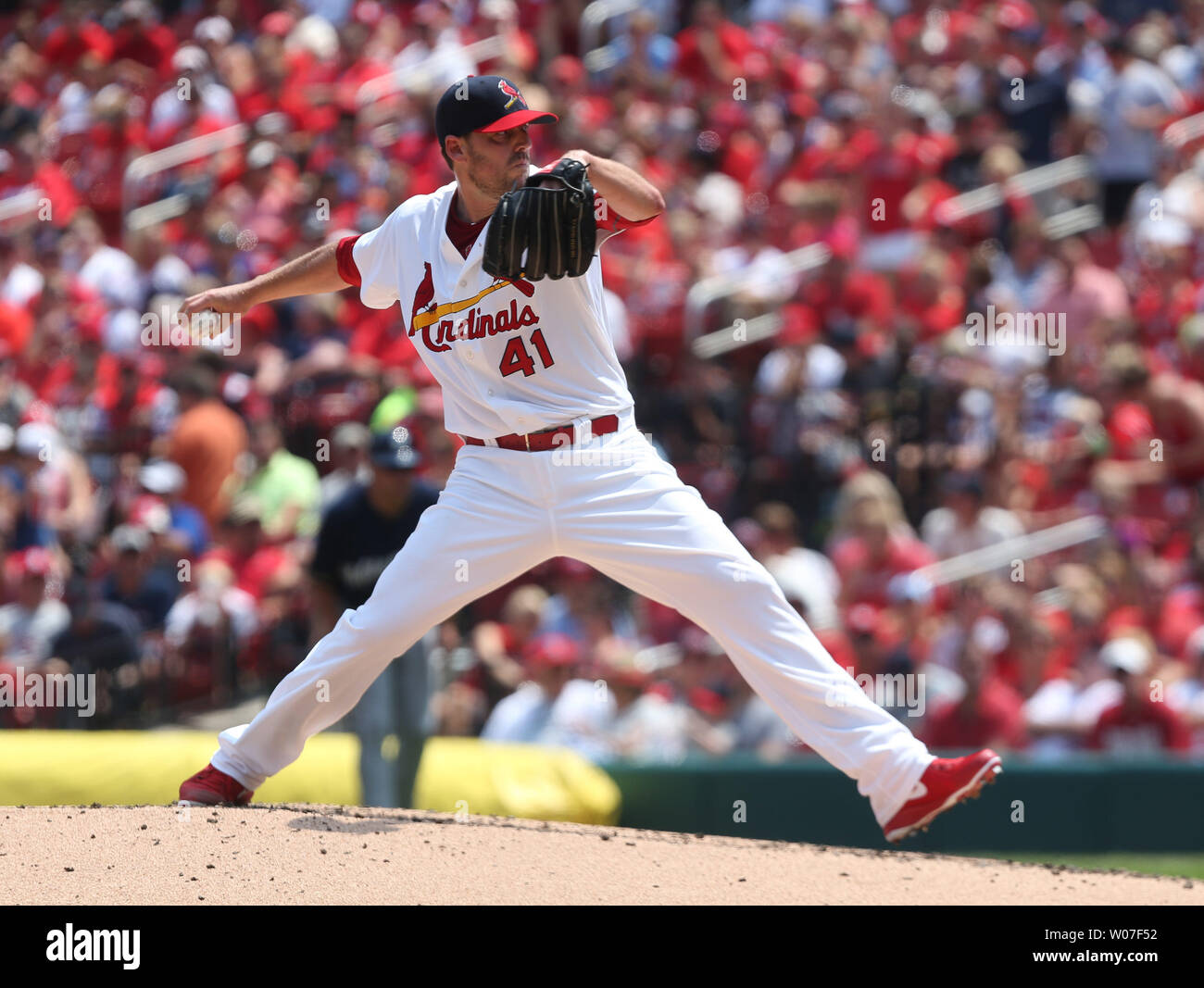 St. Louis Cardinals starting pitcher John Lackey delivers a pitch to ...