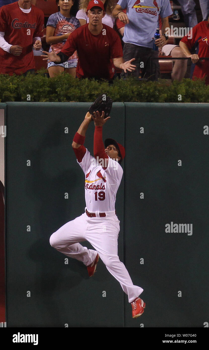 St. Louis Cardinals centerfielder Jon Jay goes up against the wall to ...