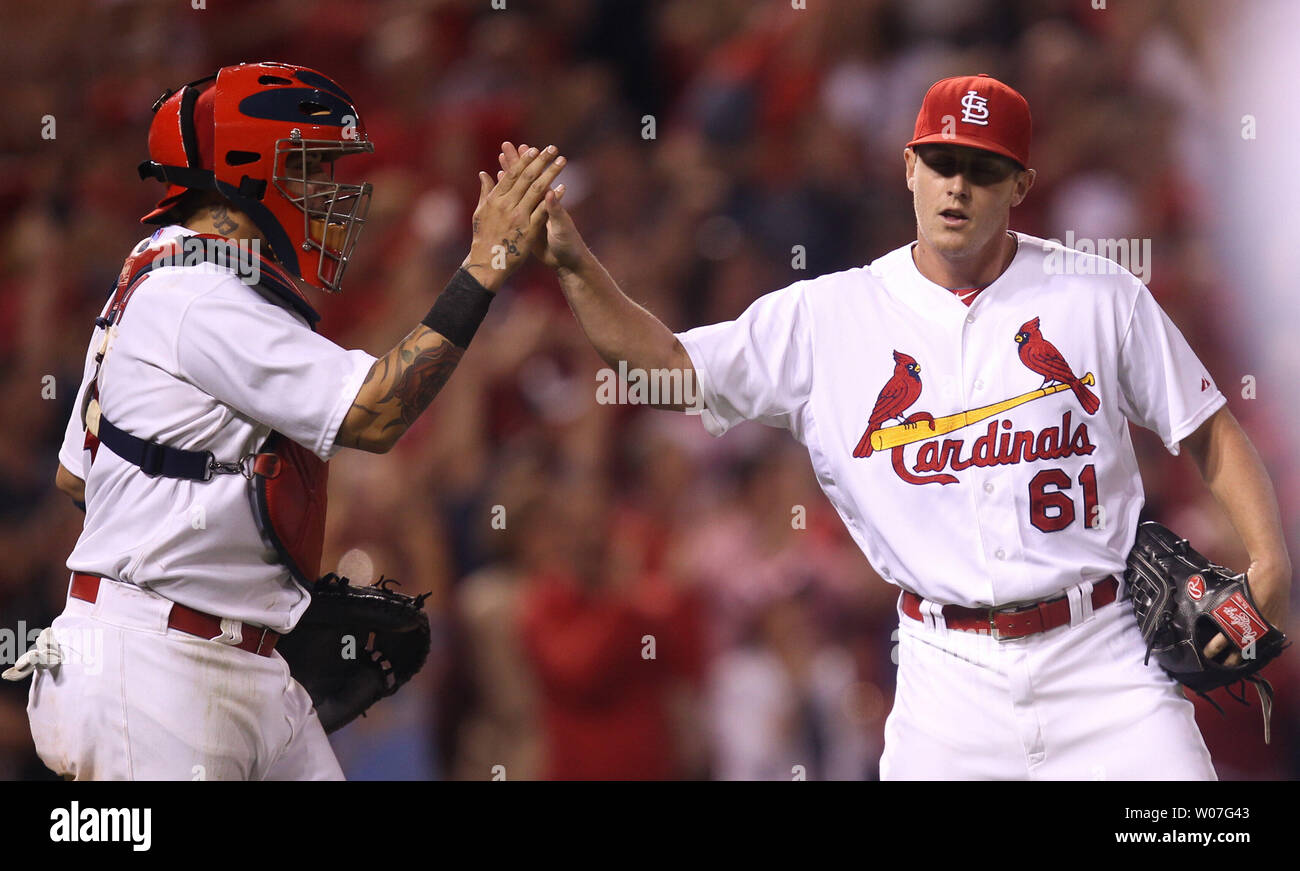 St. Louis Cardinals Yadier Molina congratulates pitcher Seth Maness for ...